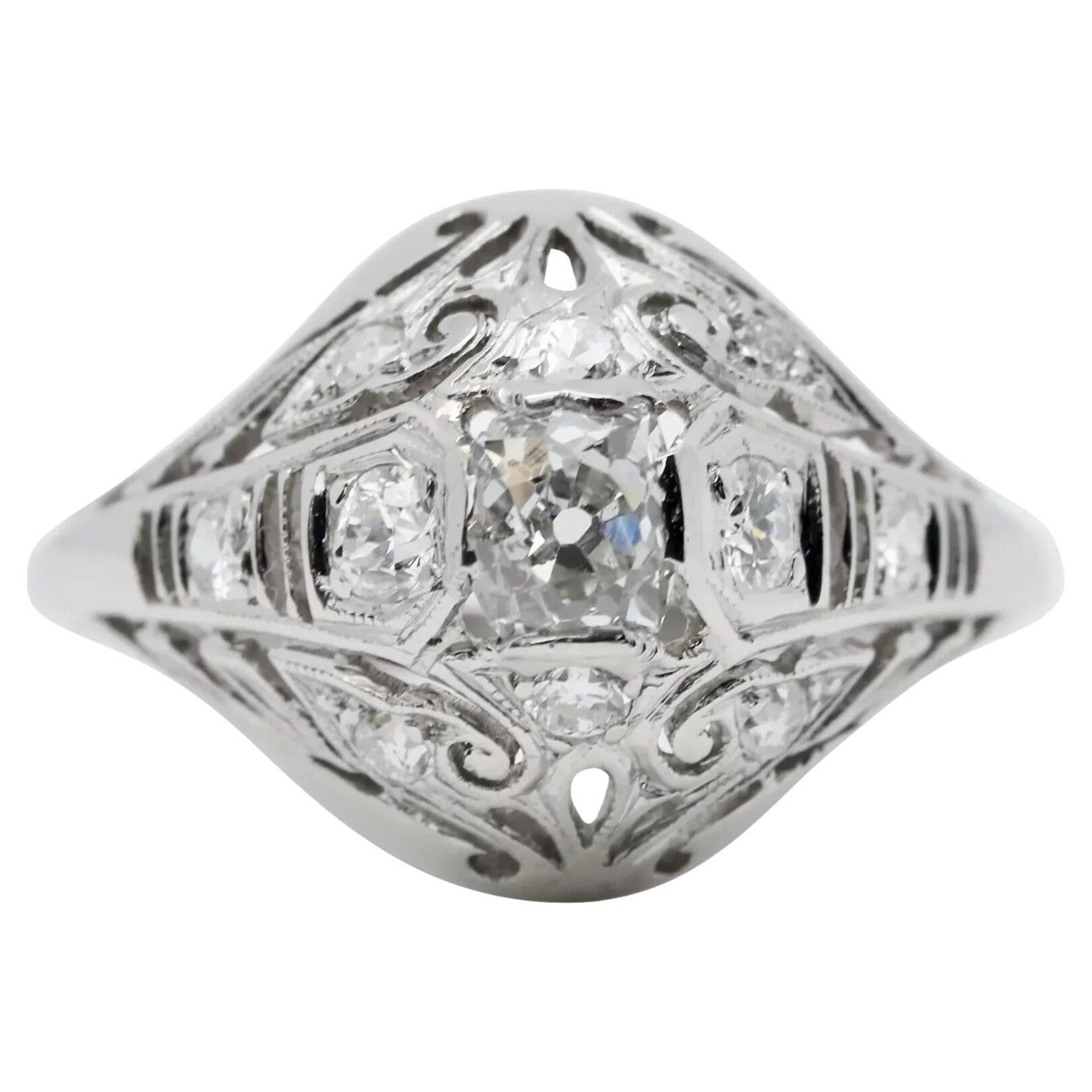 Edwardian 0.71ct Old Mine Cut Diamond Filigree Engagement Ring in Platinum For Sale at 1stDibs