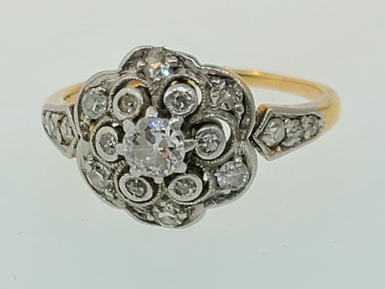 Edwardian 18k Daisy Diamond Engagement Ring For Sale at 1stDibs