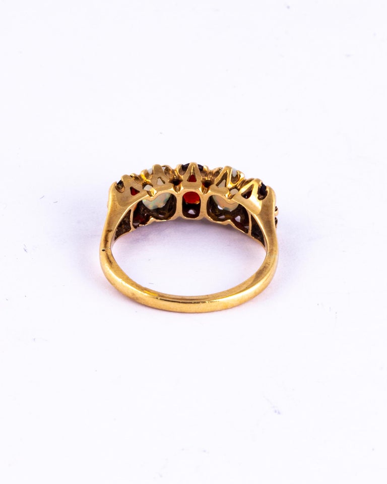 Edwardian Garnet and Opal 9 Carat Gold Five-Stone Ring at 1stDibs