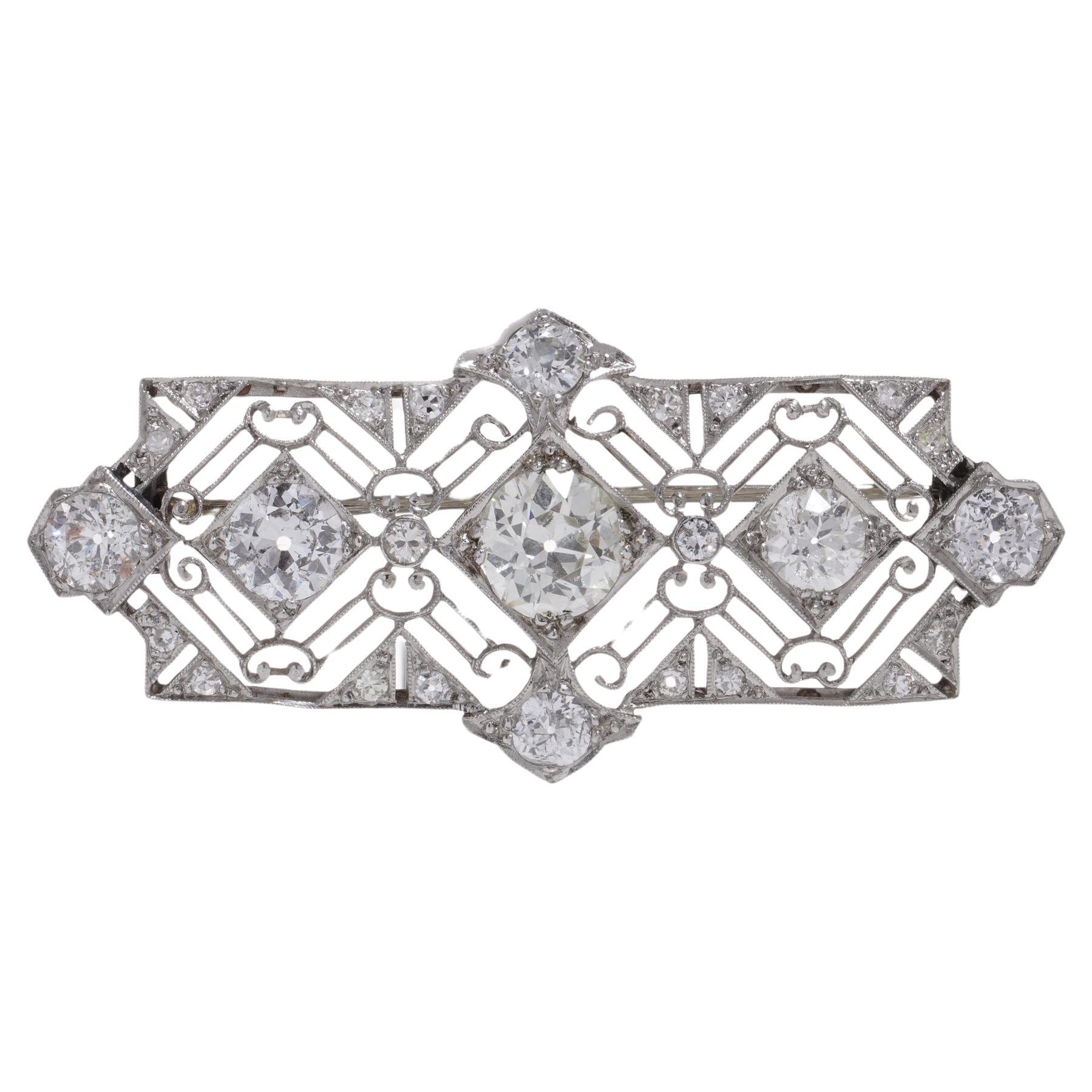 Art Deco Platinum and 8.70 cts. of diamond brooch with mille grain work ...