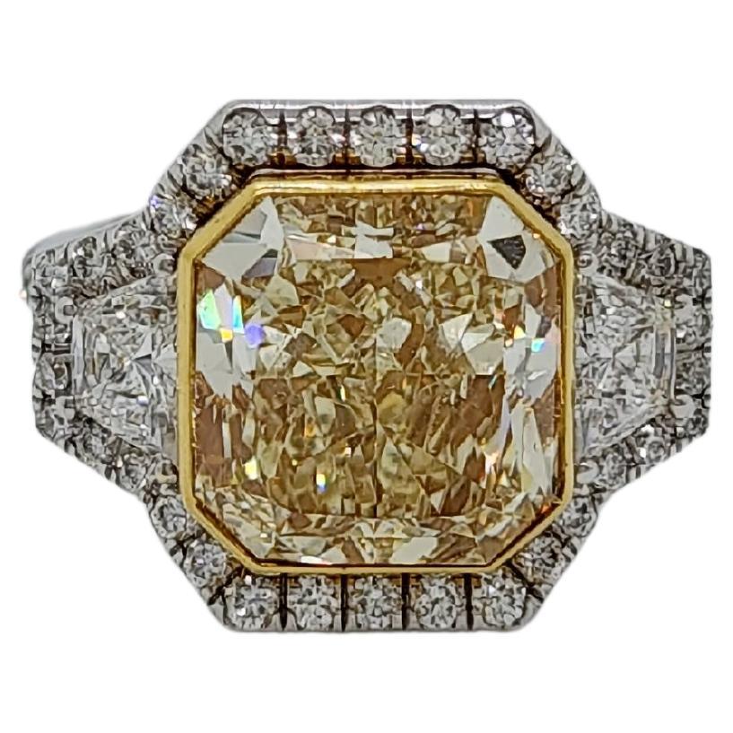 EGL Fancy Yellow Diamond Radiant and White Diamond Three Stone Ring For ...