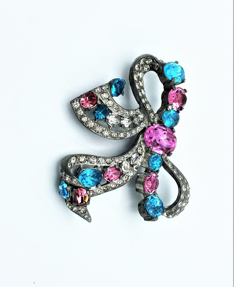EISENBERG brooch, large bow made of rhodium with pink and aqua ...