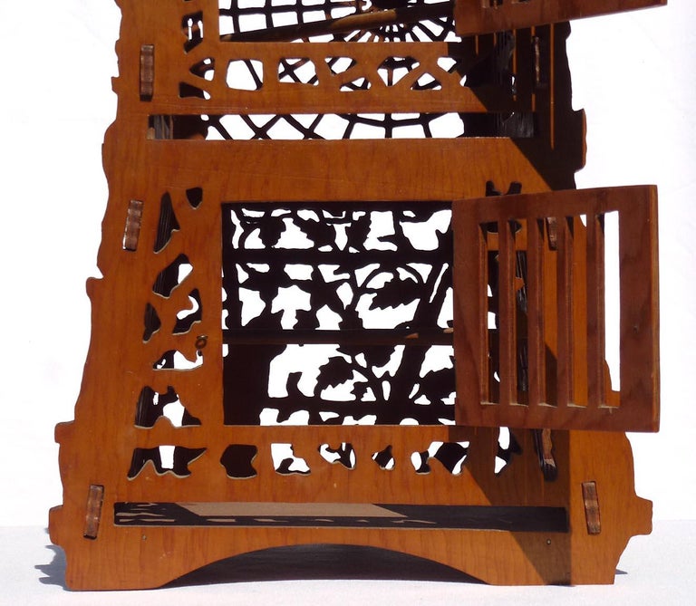 Elaborate Fretwork Bird Cage with Spider and Web and a Cat Among Leaves ...