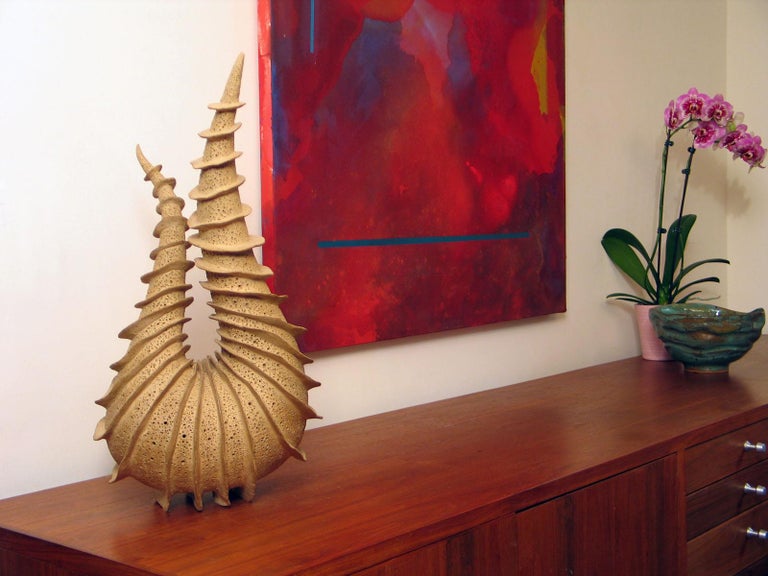 Elaine Lorenz - “Upon Itself” radiates fins spiraling around a tapering ...