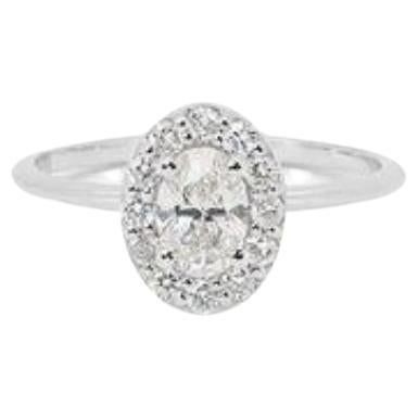 Elegant 1 Carat Oval Diamond Ring in 18K White Gold For Sale at 1stDibs