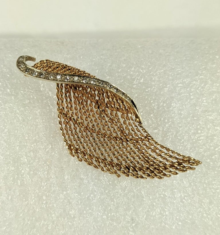 Elegant Diamond and Gold Wave Brooch For Sale at 1stDibs