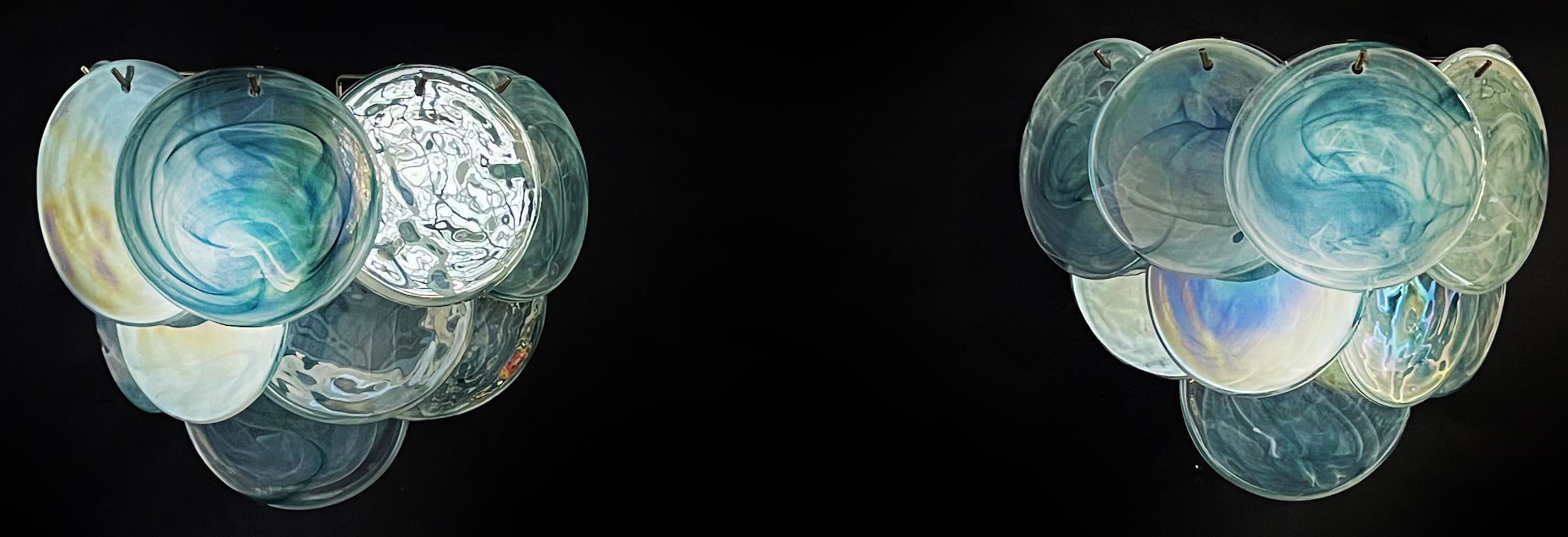 Elegant Pair of glass wall sconces - 10 iridescent alabaster blue discs ...
