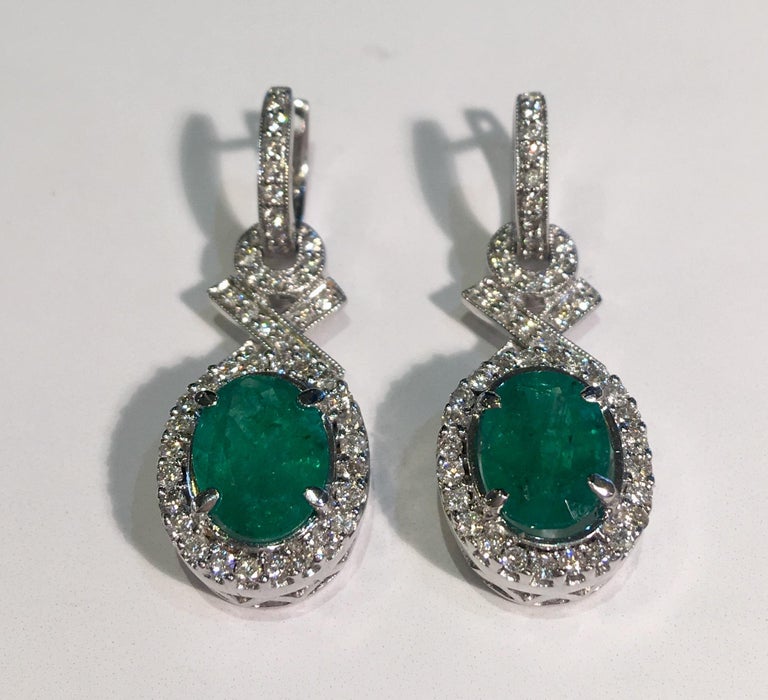 Elegant "XO" Oval Emerald and Diamond Halo 18 Karat White Gold Drop ...