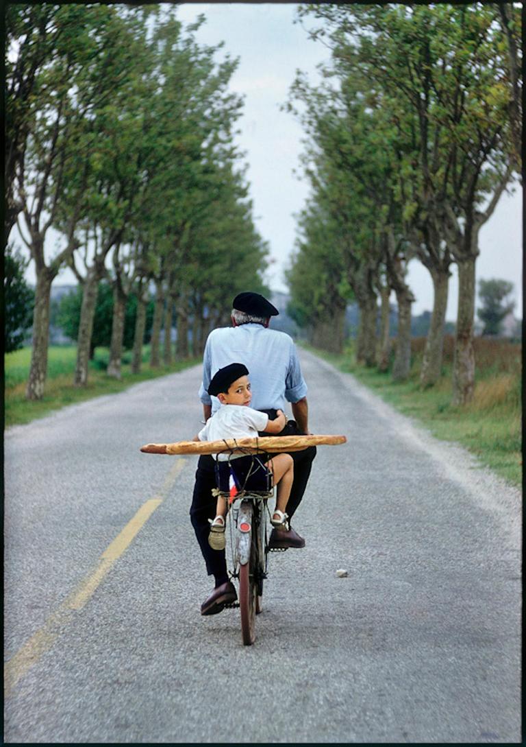 Elliott Erwitt - Provence, France (Boy, bicycle and baguette) For Sale ...