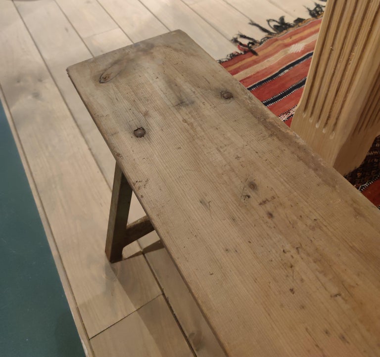 Elongated Low Wooden Bench with Iron Feet For Sale at 1stDibs