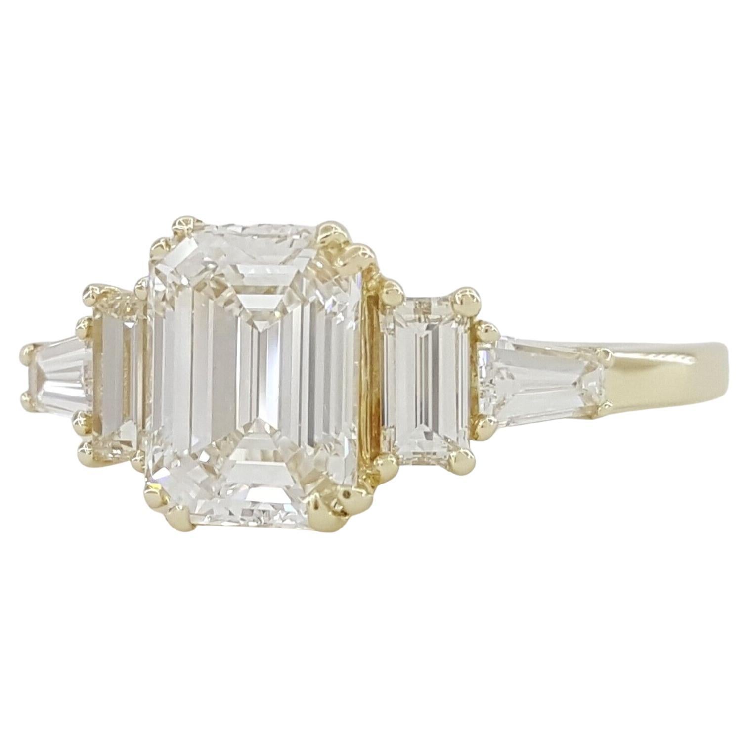 Emerald Cut Diamond Engagement Ring With Tapered Baguettes