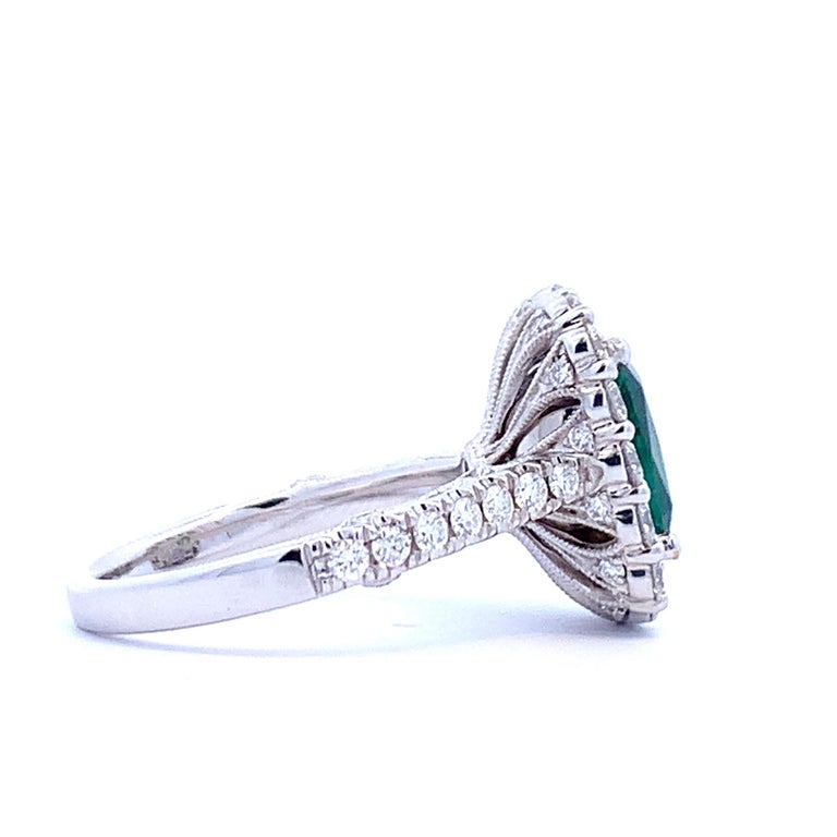 Emerald Halo Ring For Sale at 1stDibs