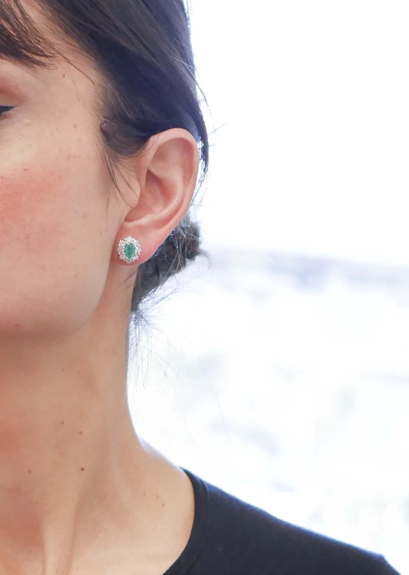 Emeralds, Diamonds, Platinum Stud Earrings. at 1stDibs