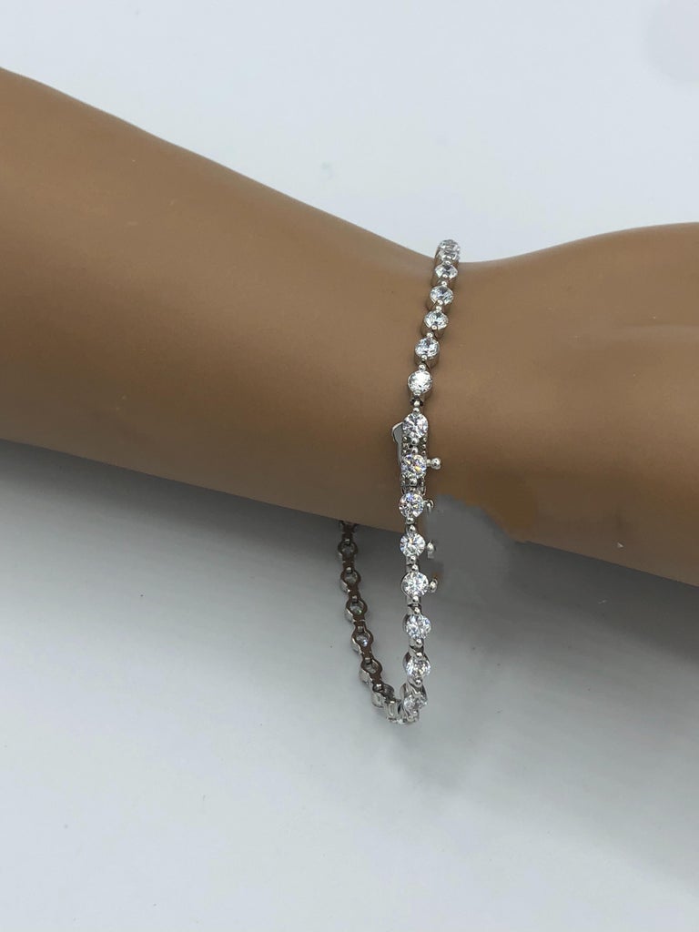 Emilio Jewelry Trademark Floating Diamond Bracelet .10 Carat Each Stone ...