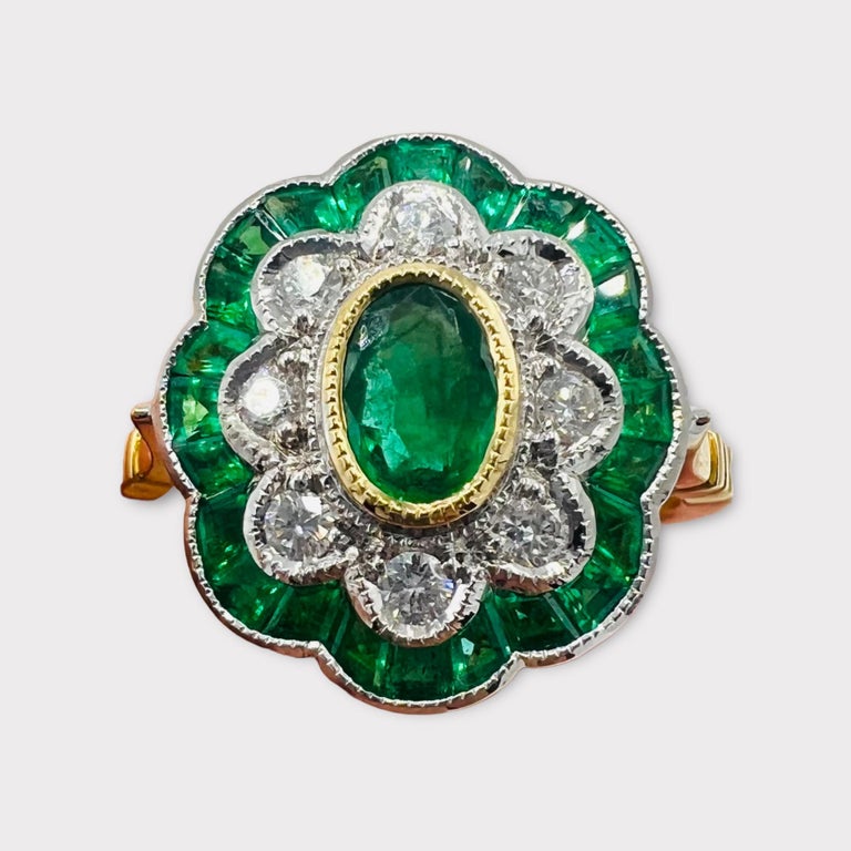 Engagement ring in 18 carat gold set with emeralds and pavé diamonds ...