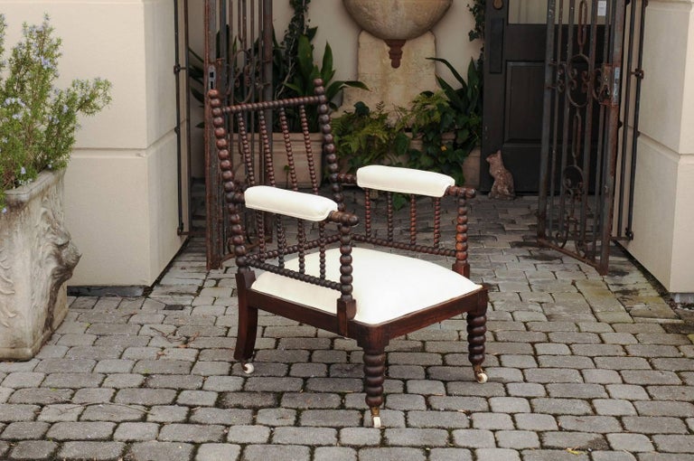 English 1870s Bobbin Chair with Slanted Back, Casters and Upholstered ...