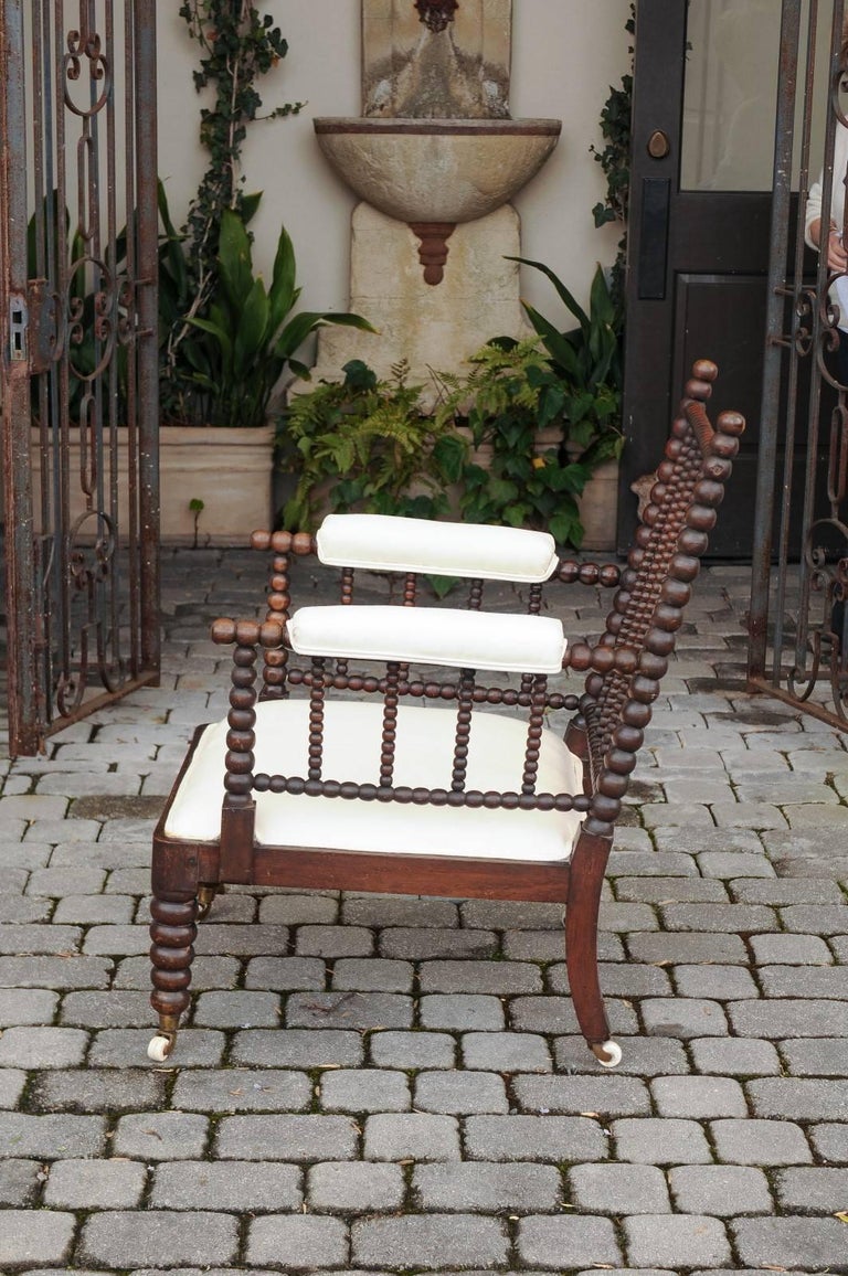 English 1870s Bobbin Chair with Slanted Back, Casters and Upholstered ...