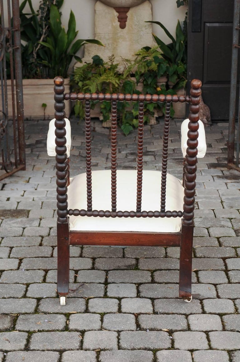 English 1870s Bobbin Chair with Slanted Back, Casters and Upholstered ...