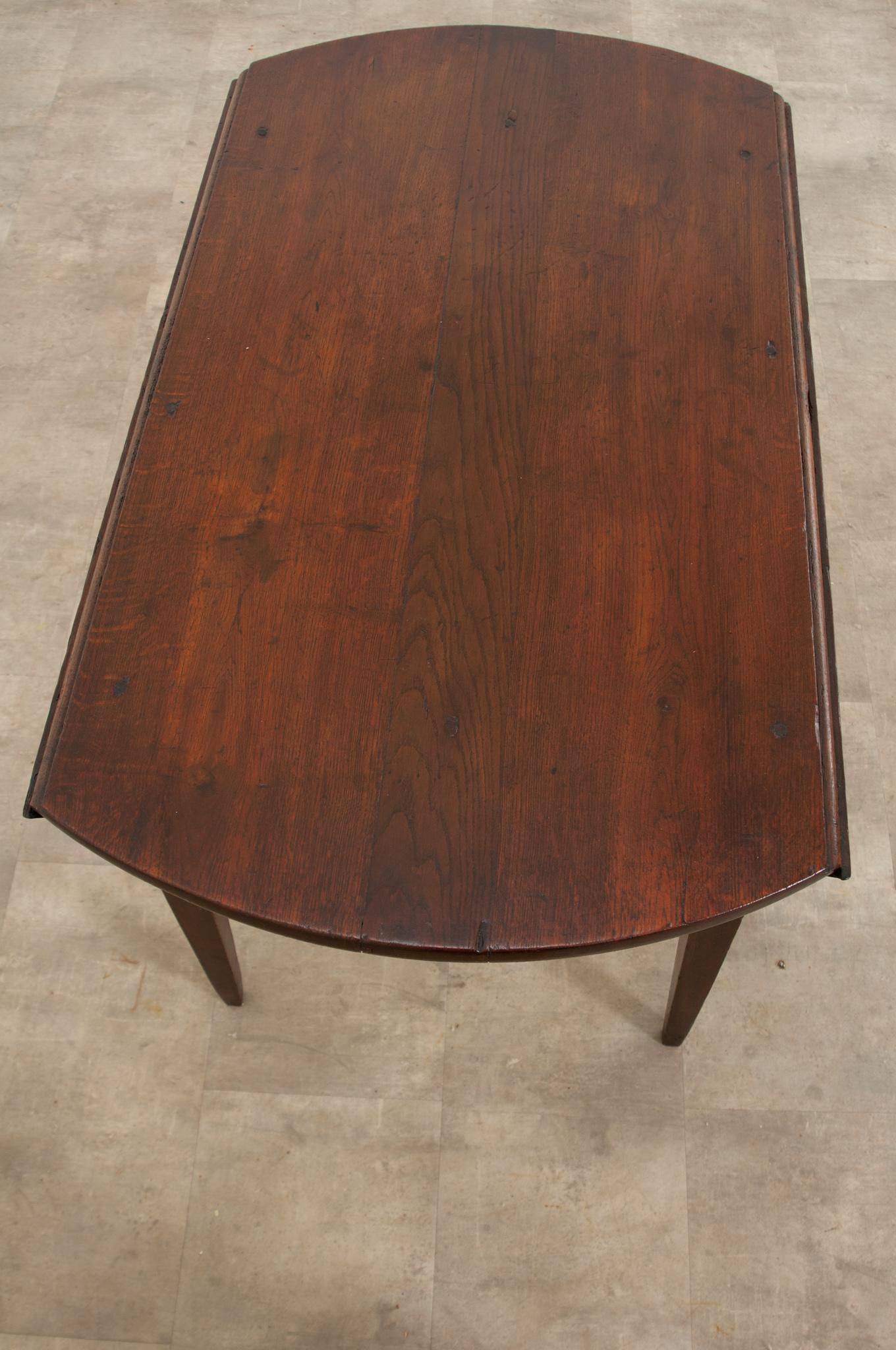 English 19th Century Solid Oak Drop-leaf Table For Sale at 1stDibs
