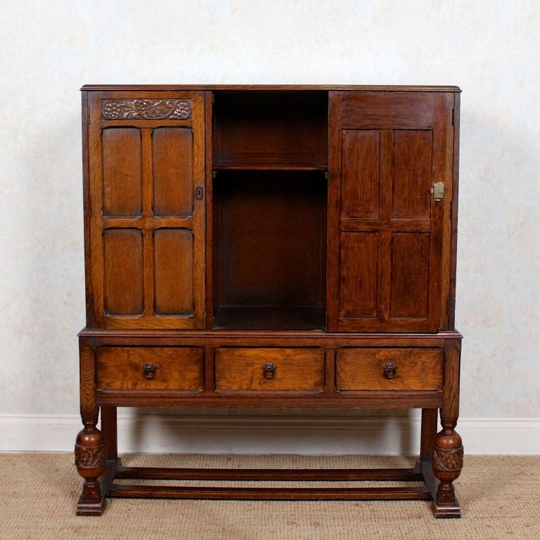 English Carved Oak Cupboard Sideboard Credenza Cabinet For Sale at 1stDibs