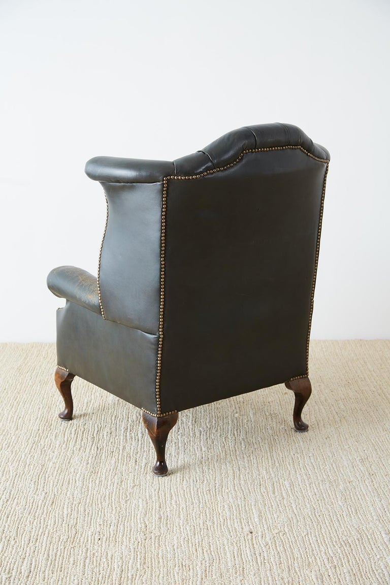 English Chesterfield Tufted Leather Wingback Library Chair at 1stDibs