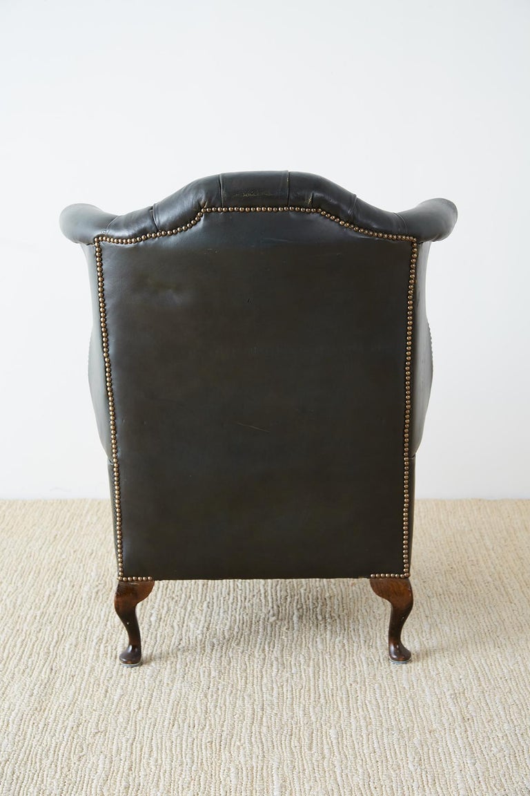 English Chesterfield Tufted Leather Wingback Library Chair at 1stDibs