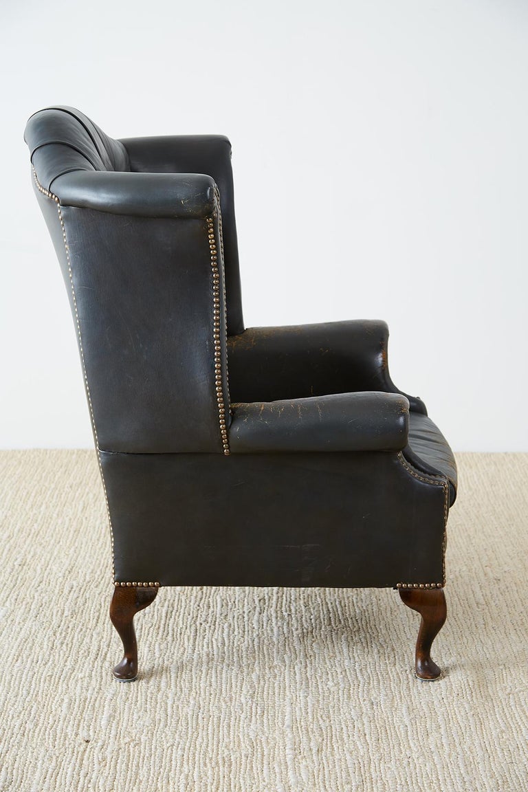 English Chesterfield Tufted Leather Wingback Library Chair at 1stDibs