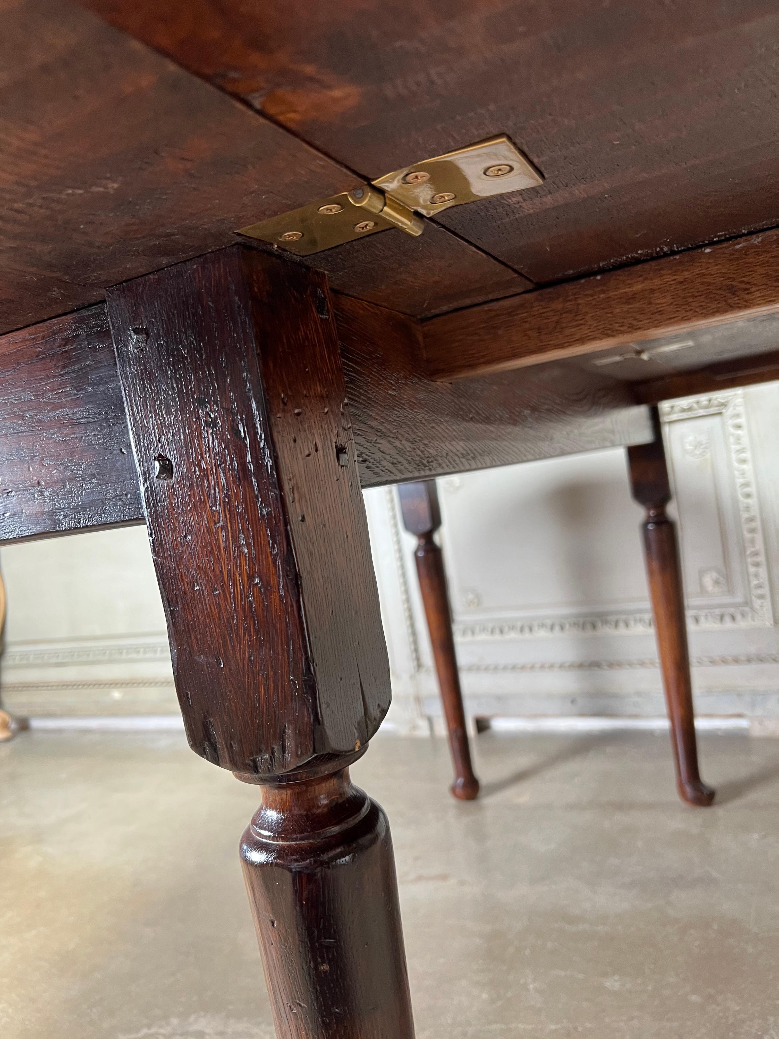 English Country Style Oak Oval Drop-leaf Dining Table For Sale at 1stDibs