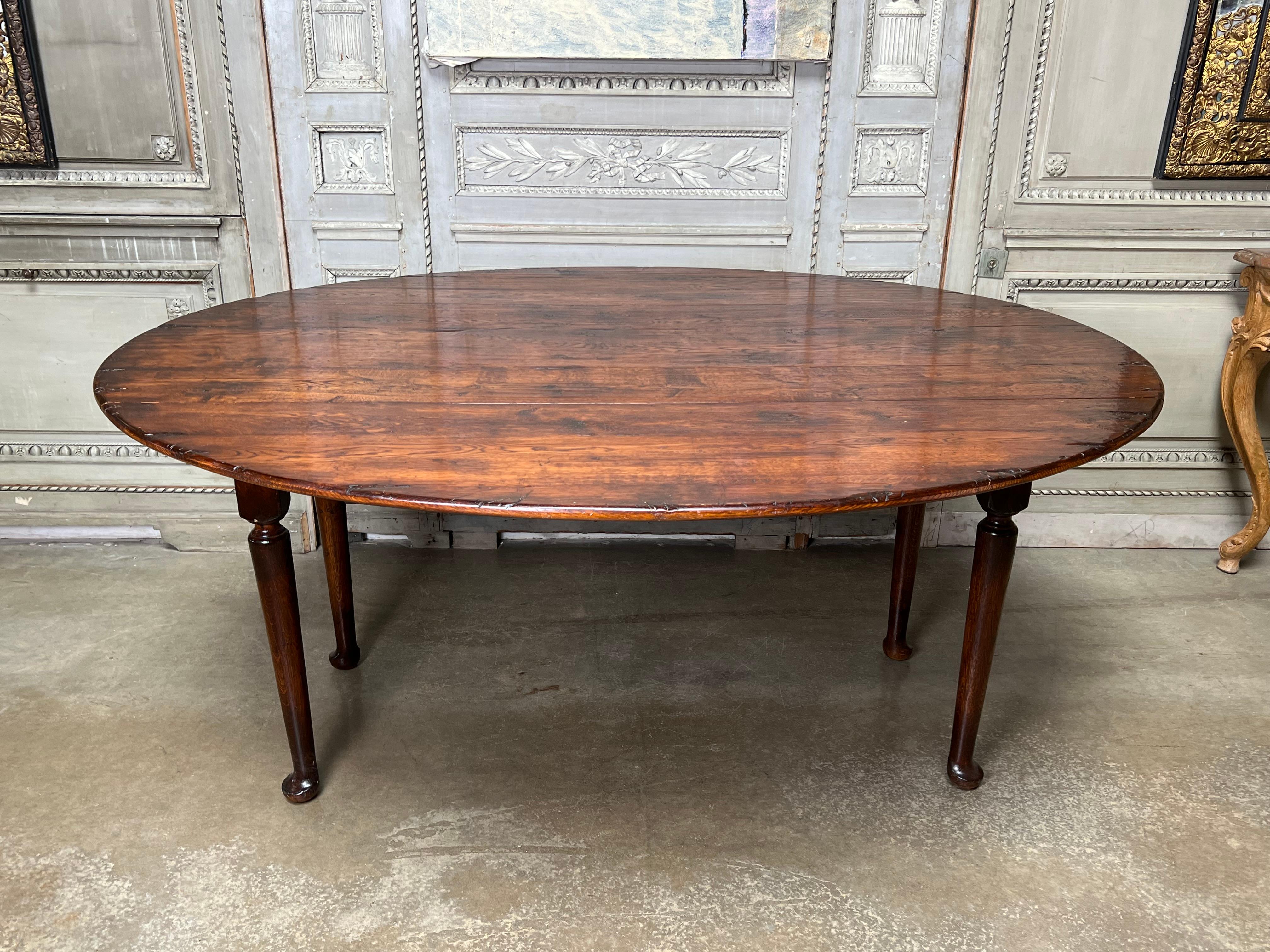 English Country Style Oak Oval Drop-leaf Dining Table For Sale at 1stDibs