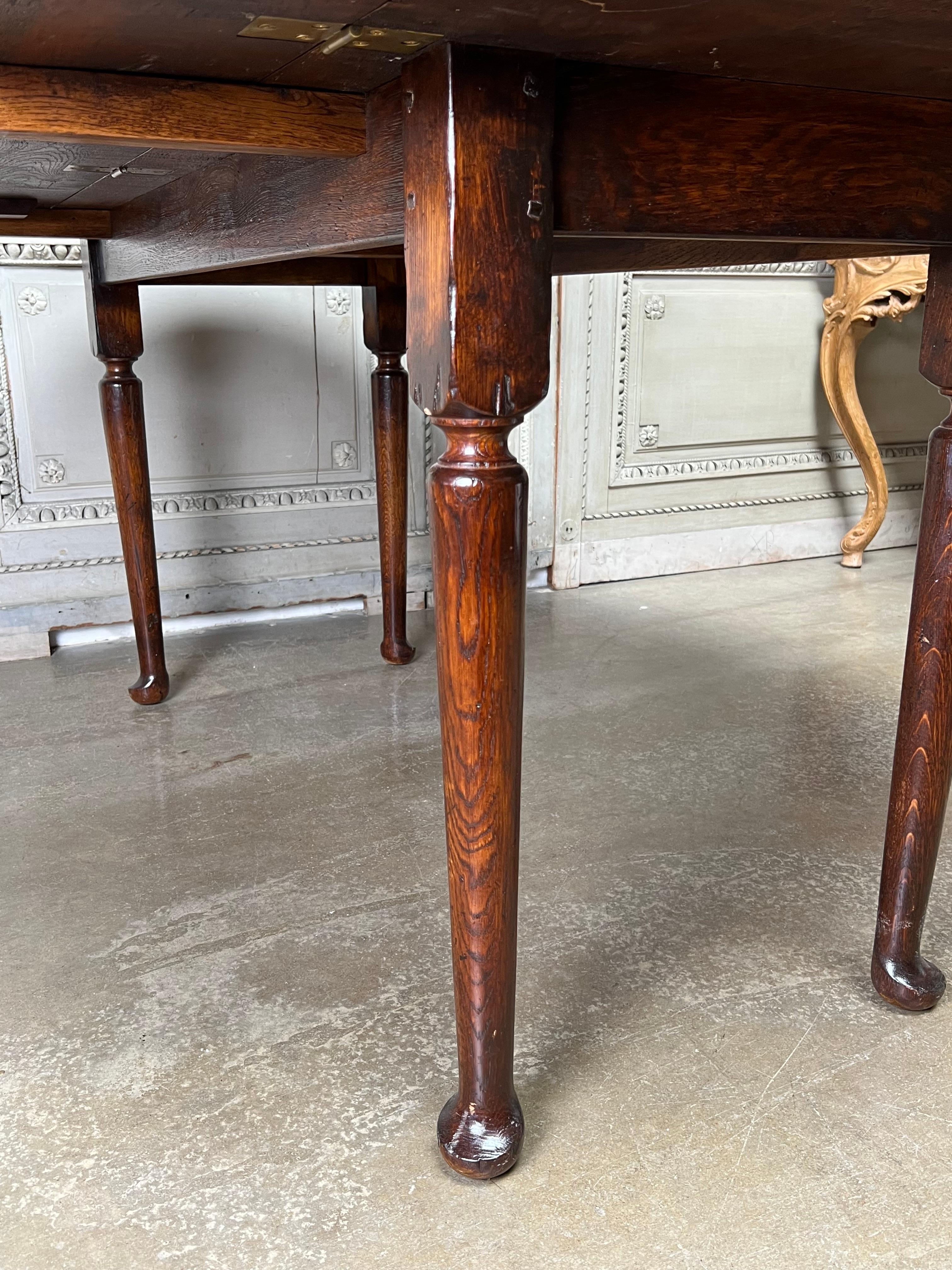 English Country Style Oak Oval Drop-leaf Dining Table For Sale at 1stDibs