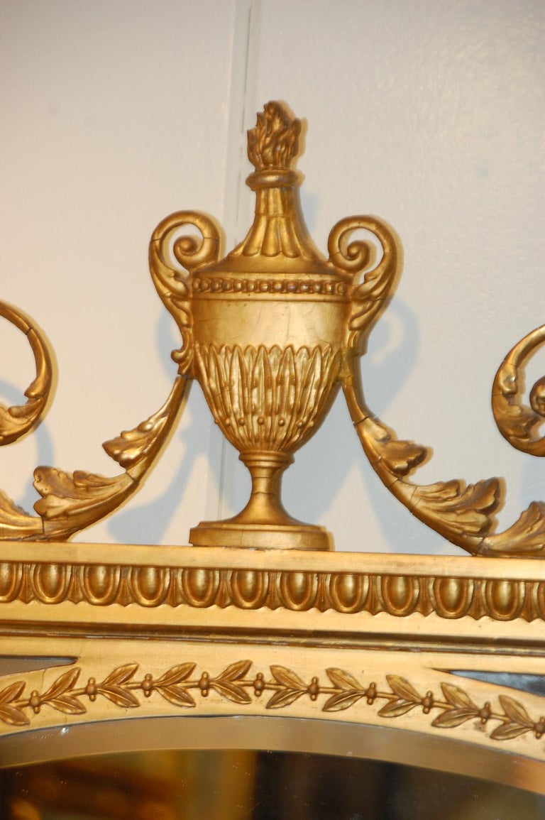 English Edwardian Gold Mirror with Urn and Trailing Leaves Surmounting ...