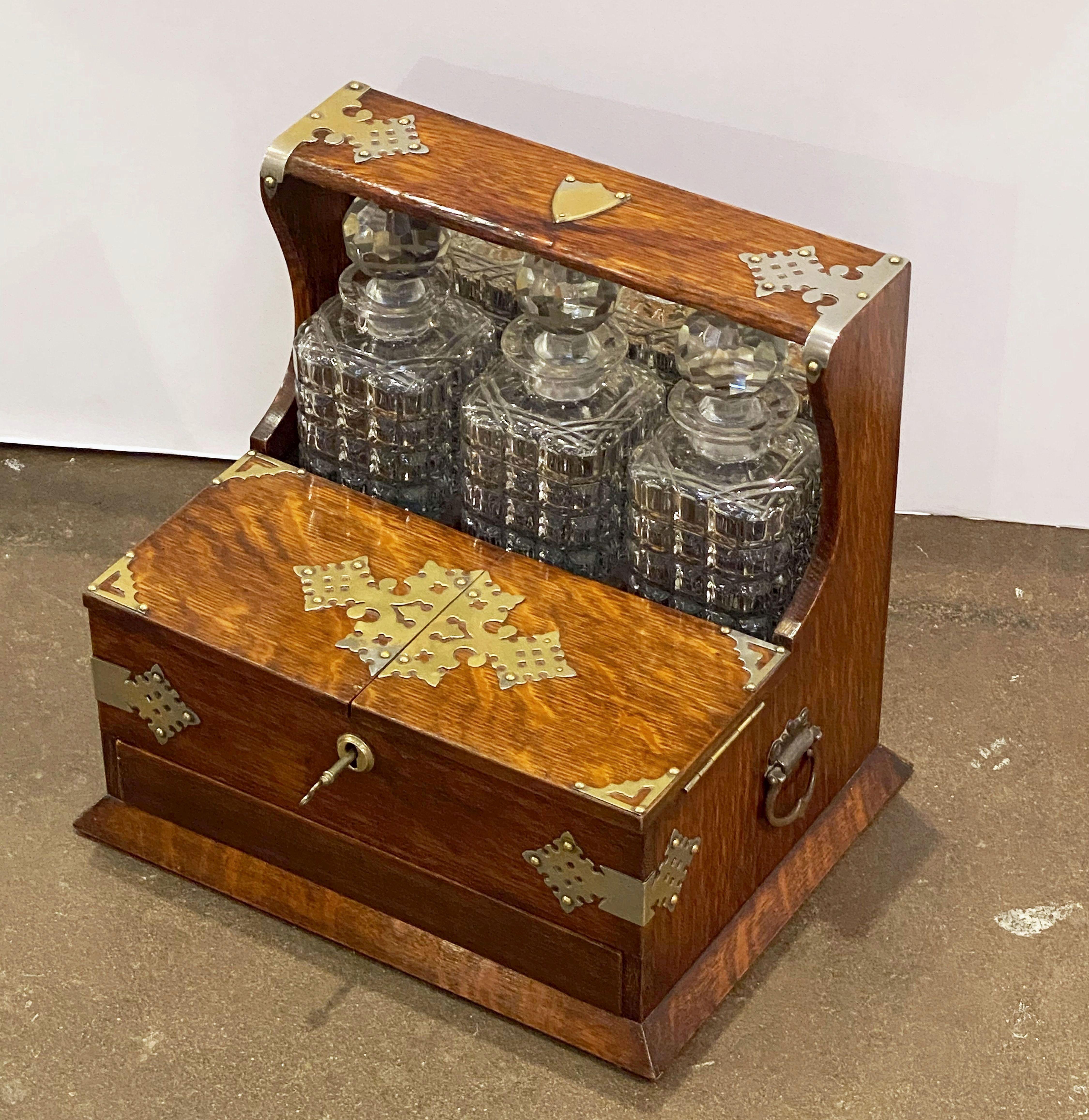 English Gaming Compendium and Tantalus of Oak with Three Decanters at ...