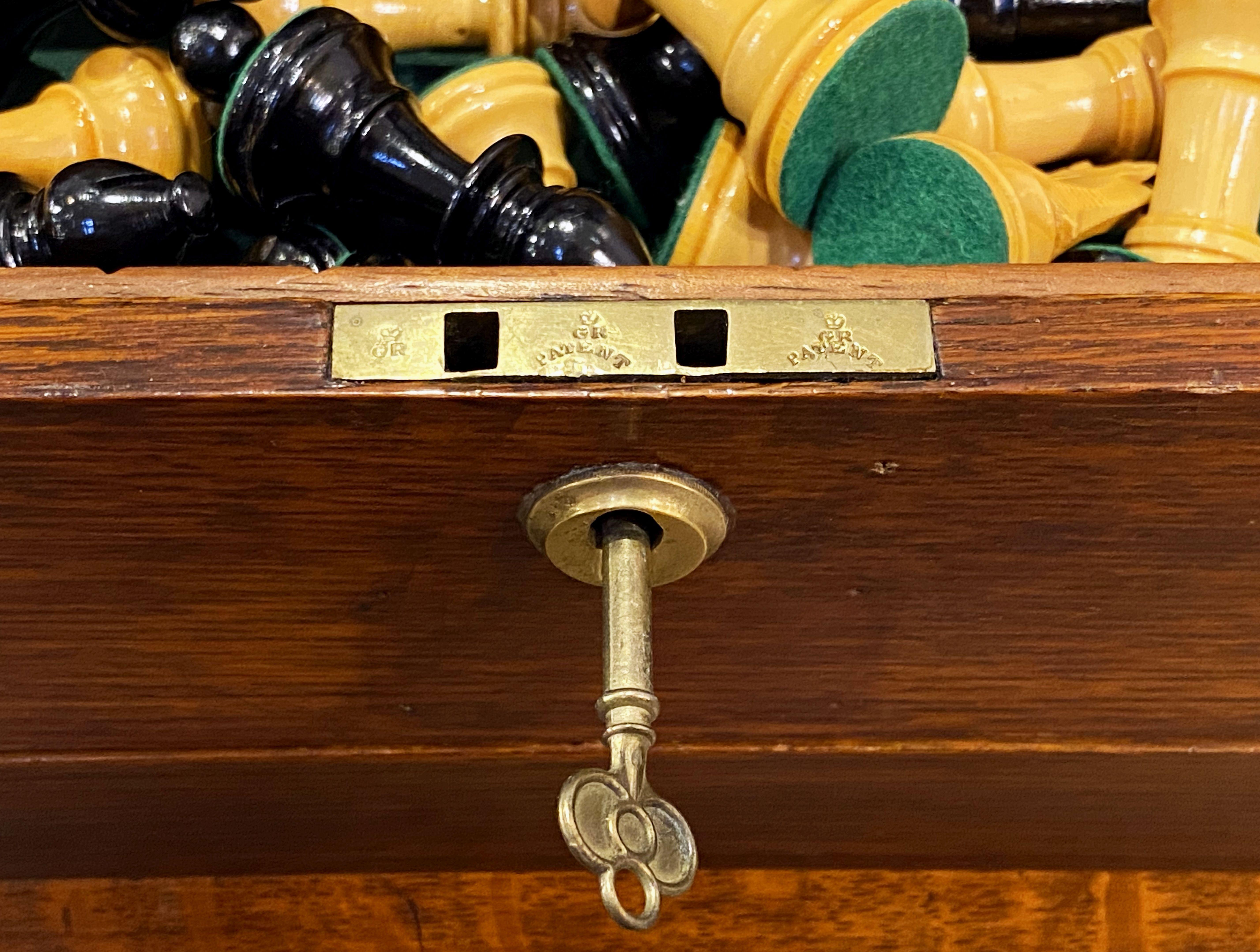 English Gaming Compendium and Tantalus of Oak with Three Decanters at ...
