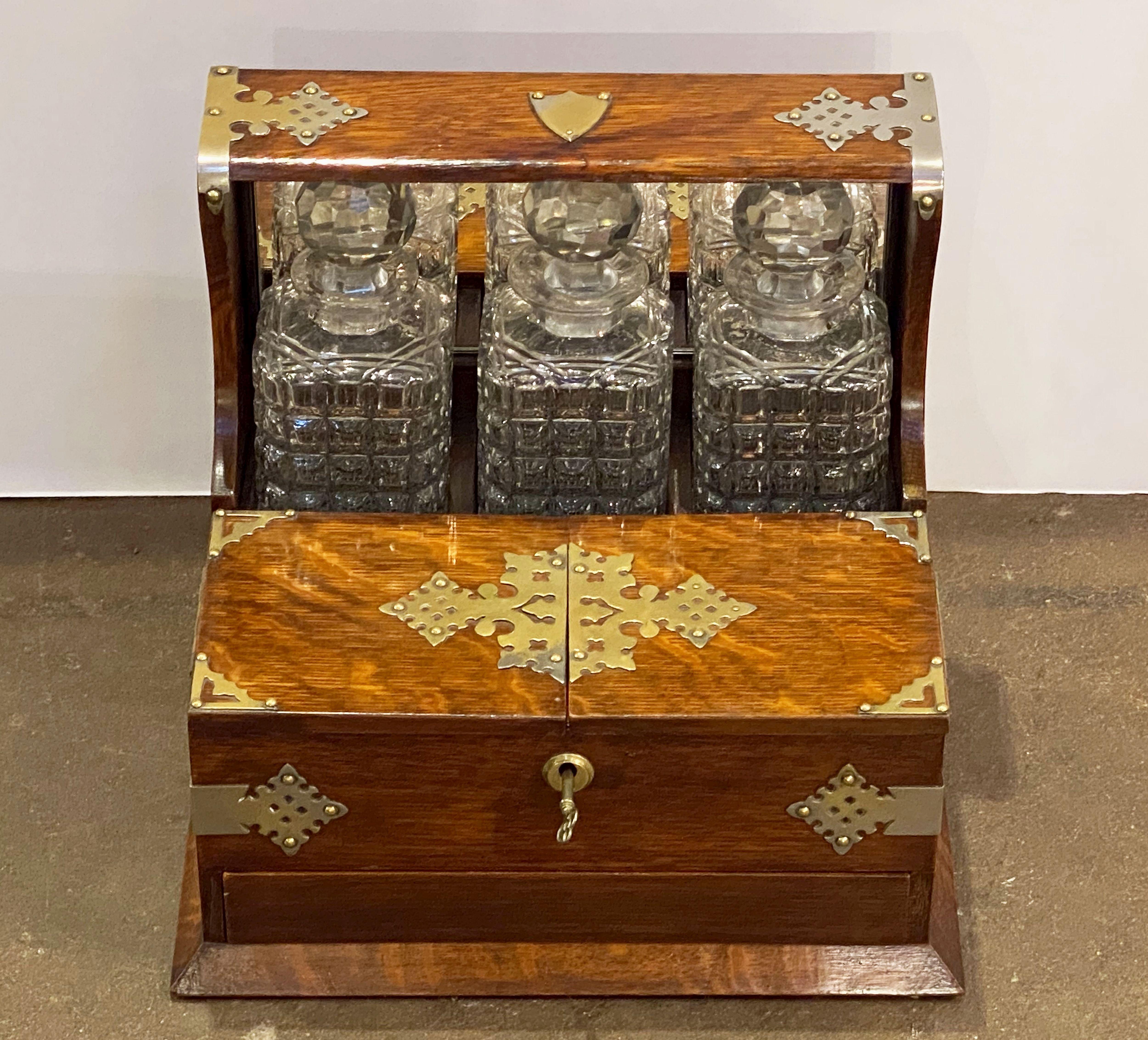 English Gaming Compendium and Tantalus of Oak with Three Decanters at ...