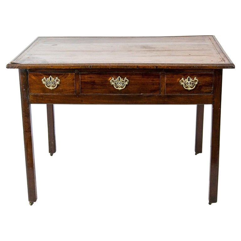 English Leather Top Center Table on Castors For Sale at 1stDibs