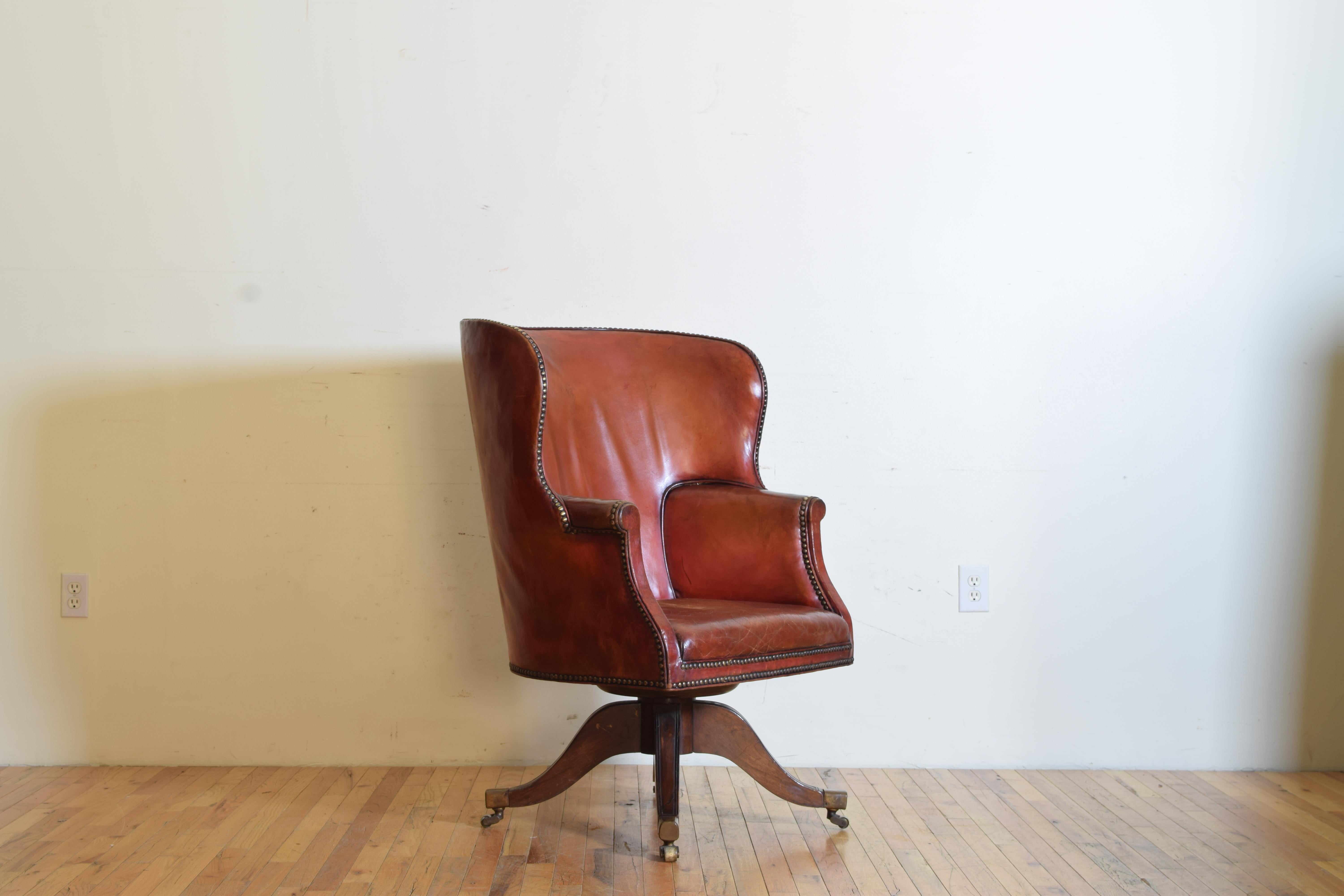 English Mahogany and Leather Upholstered Swivel Wing Chair at 1stDibs