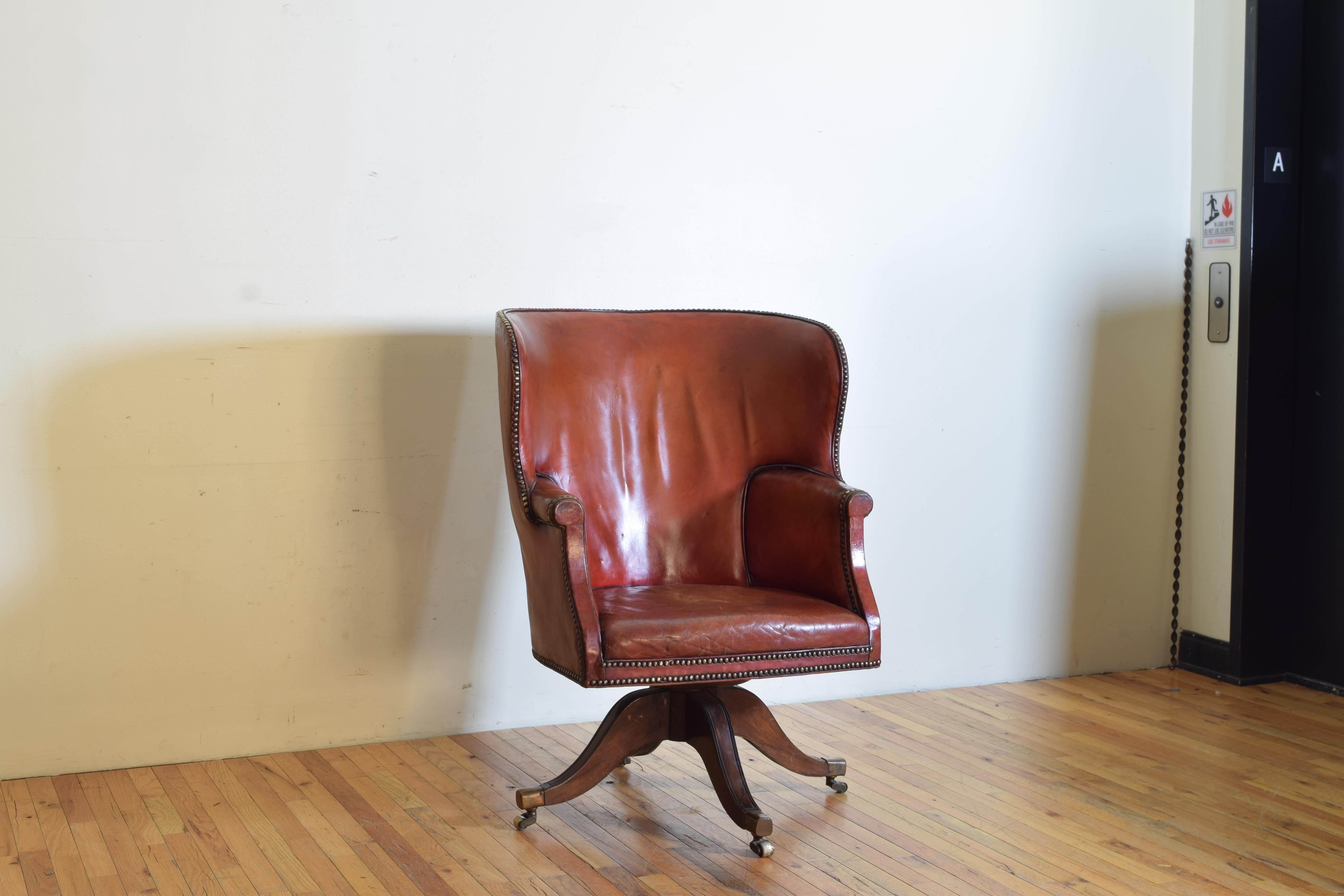 English Mahogany and Leather Upholstered Swivel Wing Chair at 1stDibs