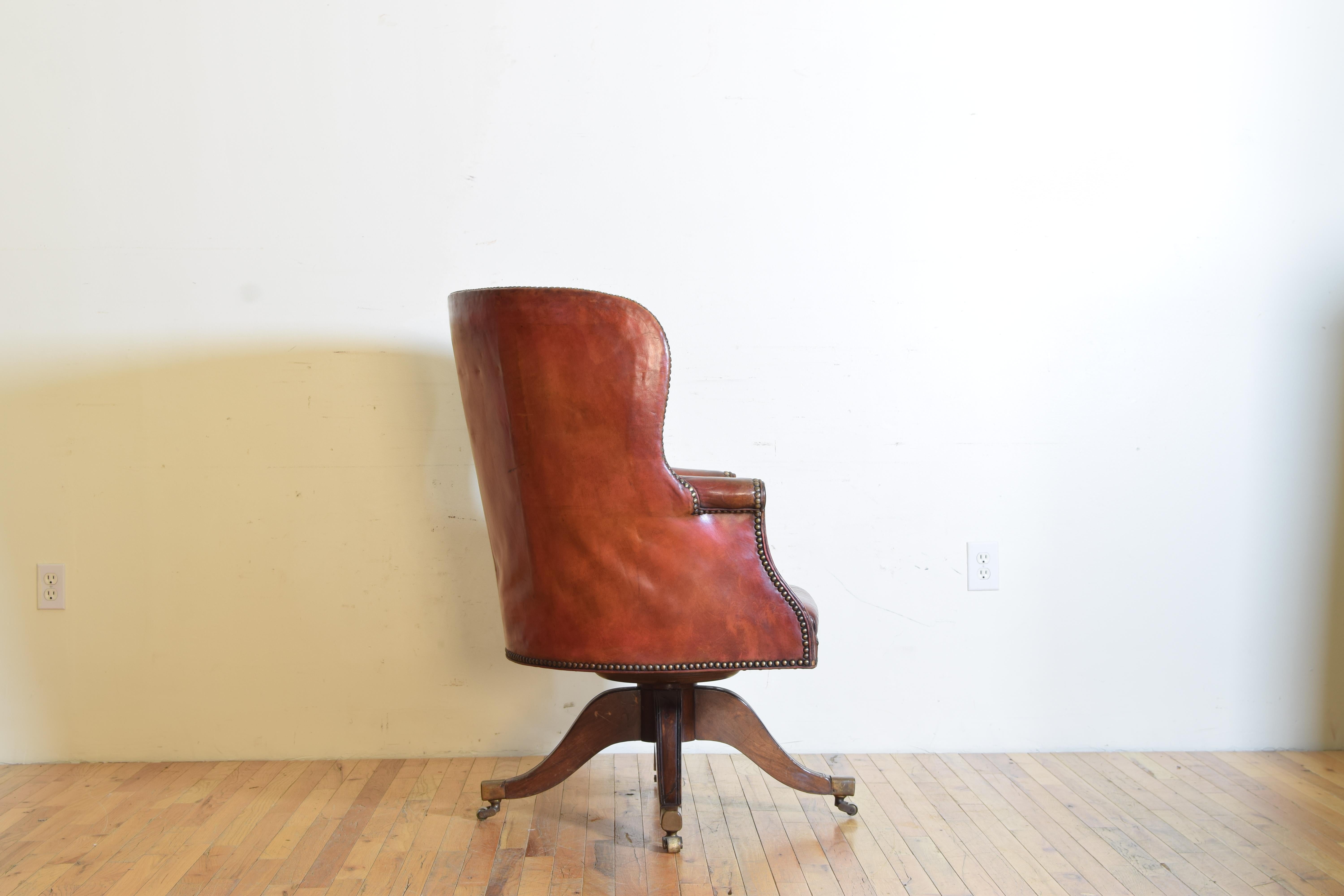 English Mahogany and Leather Upholstered Swivel Wing Chair at 1stDibs