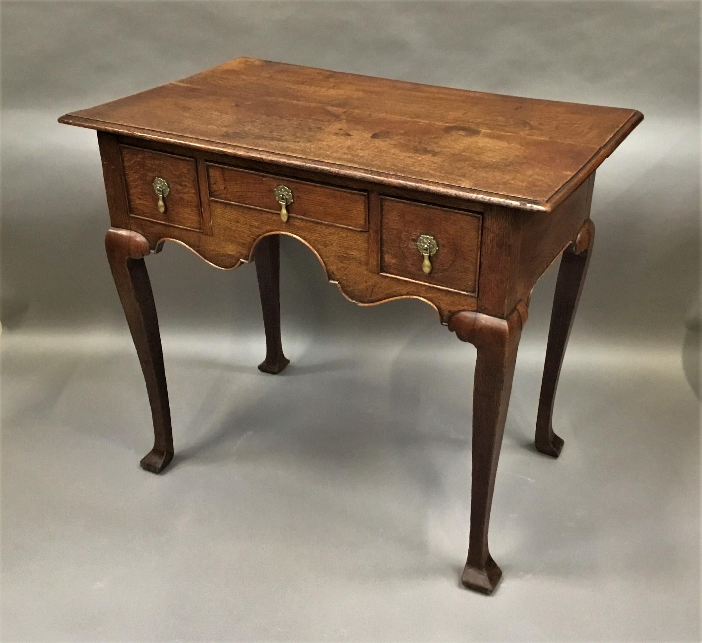 English Oak Lowboy of Shapely Form For Sale at 1stDibs
