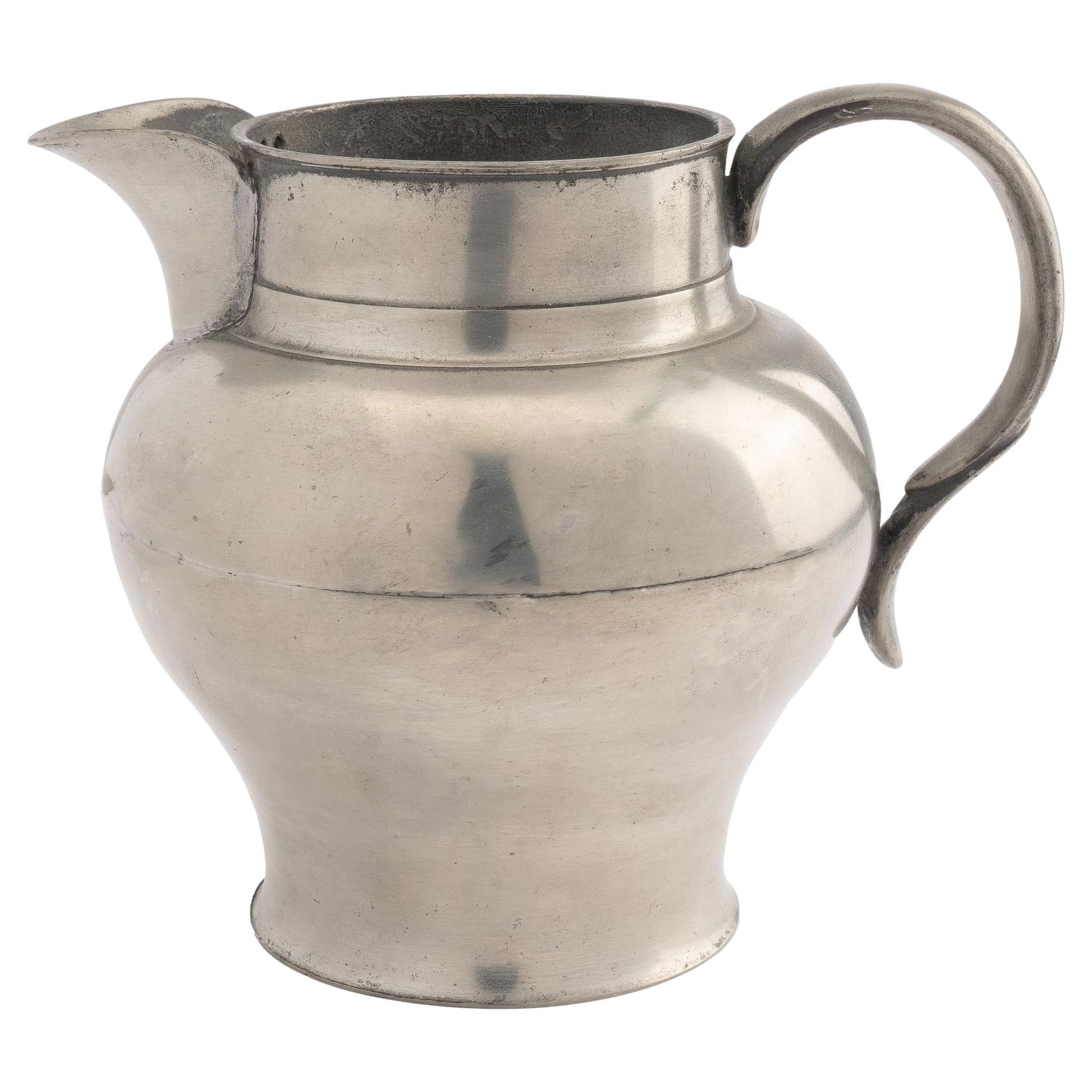 An unusual modernist water pitcher in pewter For Sale at 1stDibs
