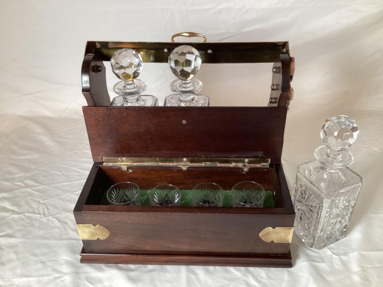 English Regency Style Brass and Mahogany Tantalus with Three Decanters ...