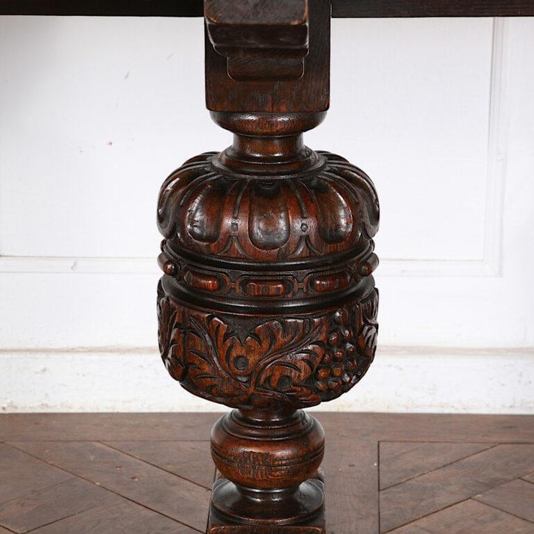 English Three Pedestal Heavily Carved Oak Trestle Table For Sale at 1stDibs