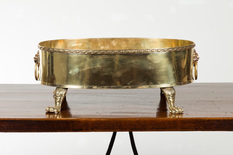 English Turn of the Century Oval Brass Cachepot with Lion Heads and Paw ...