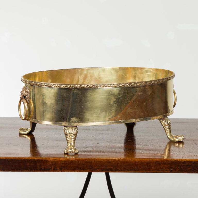 English Turn of the Century Oval Brass Cachepot with Lion Heads and Paw ...
