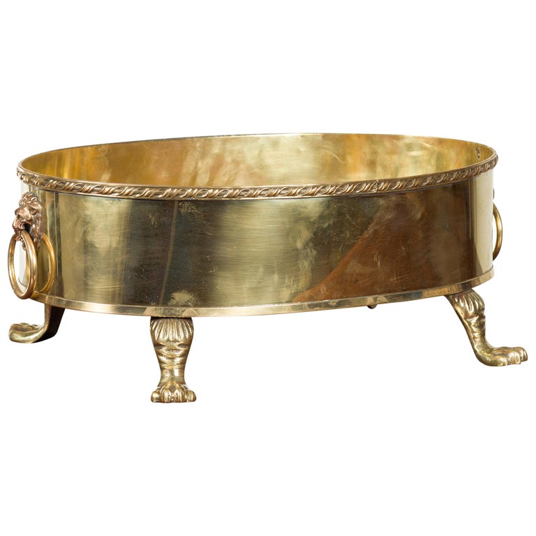 English Turn of the Century Oval Brass Cachepot with Lion Heads and Paw ...