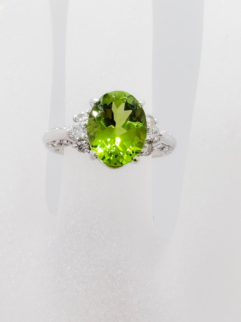 Estate Peridot Oval and White Diamond Ring in Platinum For Sale at 1stDibs