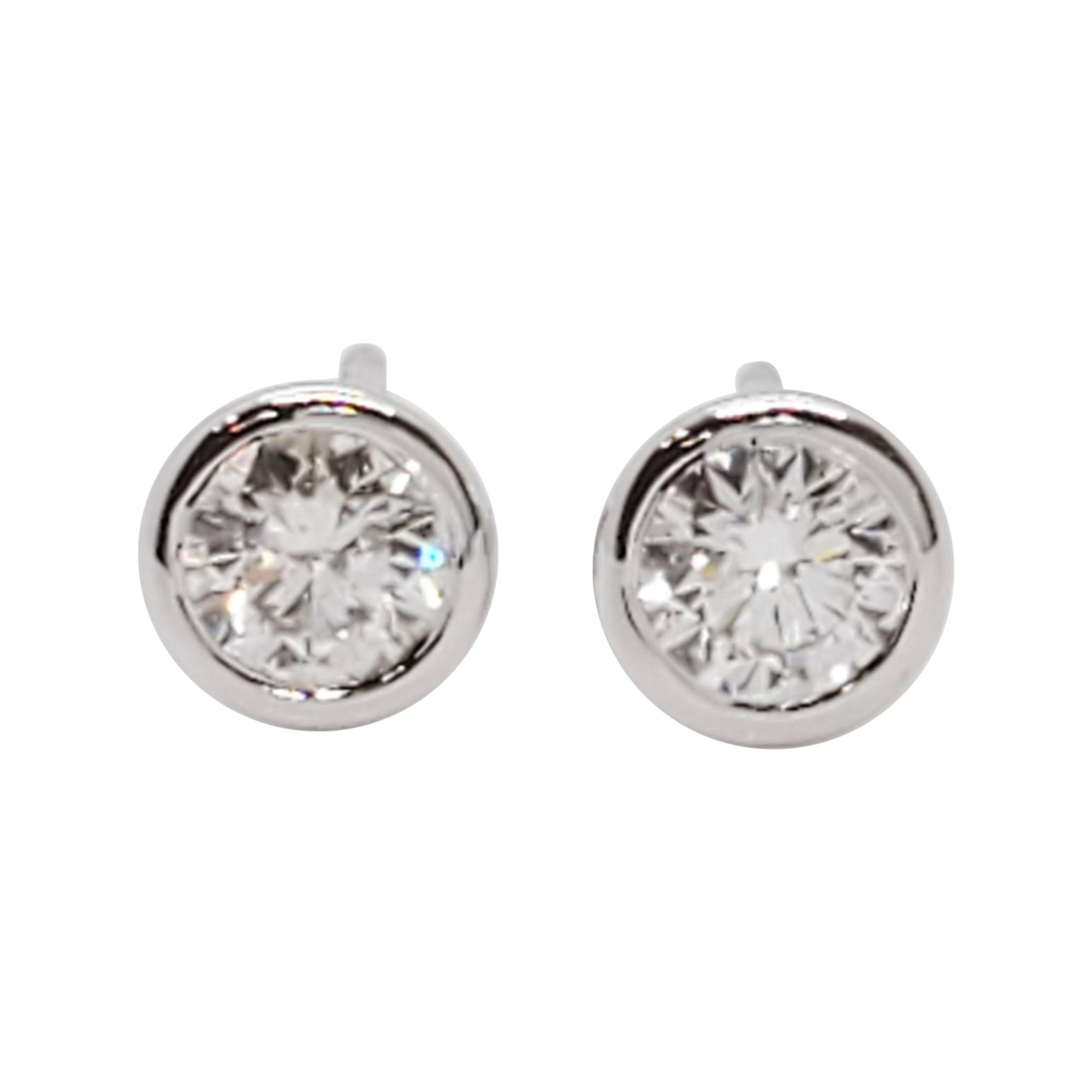 Estate White Diamond Studs in 14k Yellow Gold For Sale at 1stDibs