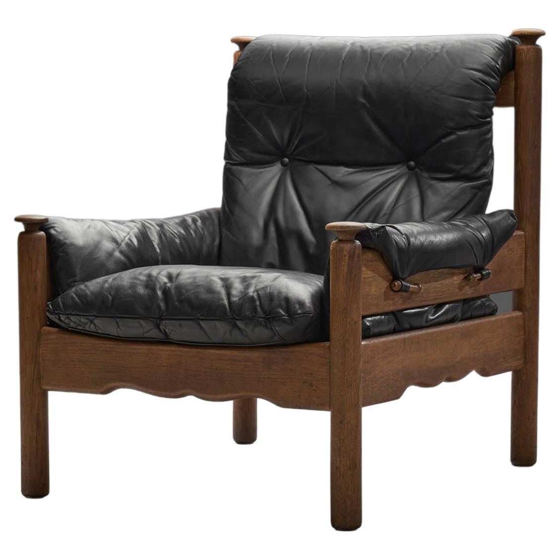 European Cabinetmaker Black Leather and Wood Lounge Chair, Europe ca ...