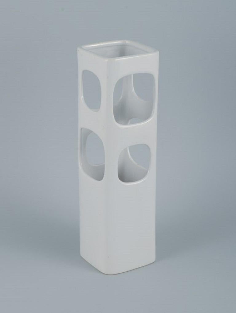 European studio ceramicist. Unique vase with holes in white glaze. For ...