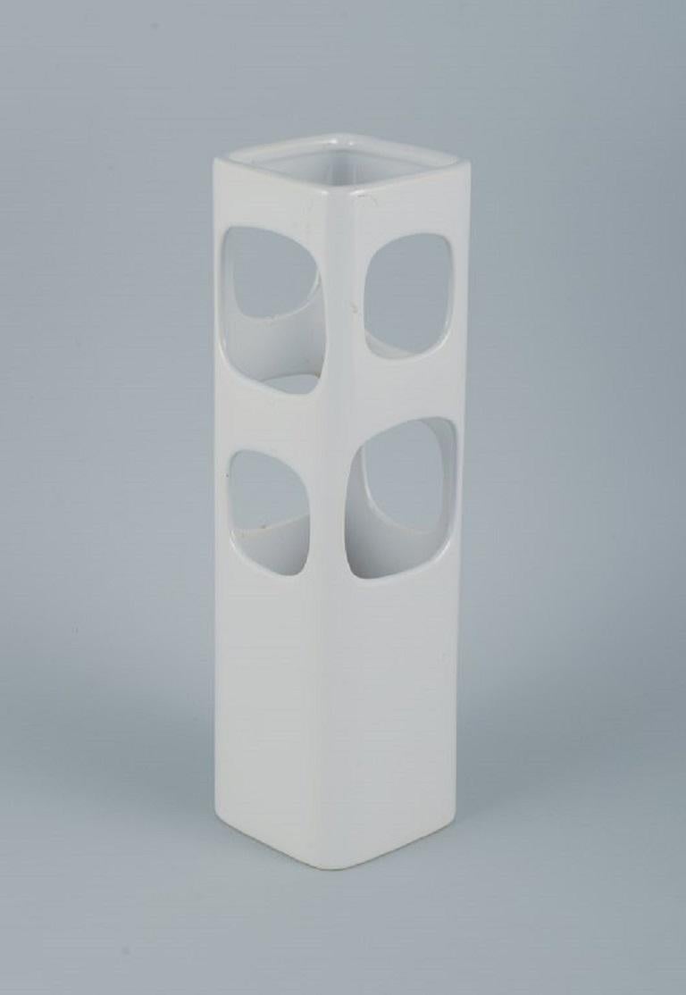 European studio ceramicist. Unique vase with holes in white glaze. For ...